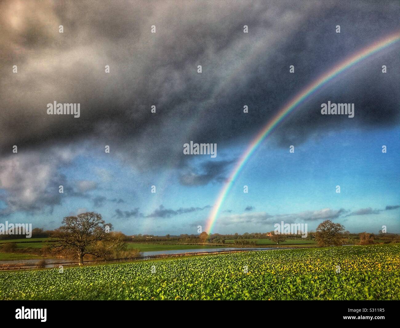 Rainbow and stormy sky hi-res stock photography and images - Alamy