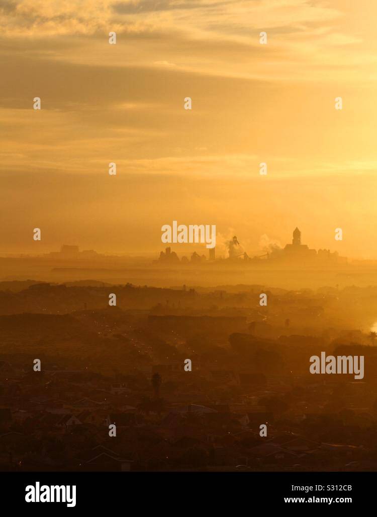 Sun rises over a factory hi-res stock photography and images - Alamy