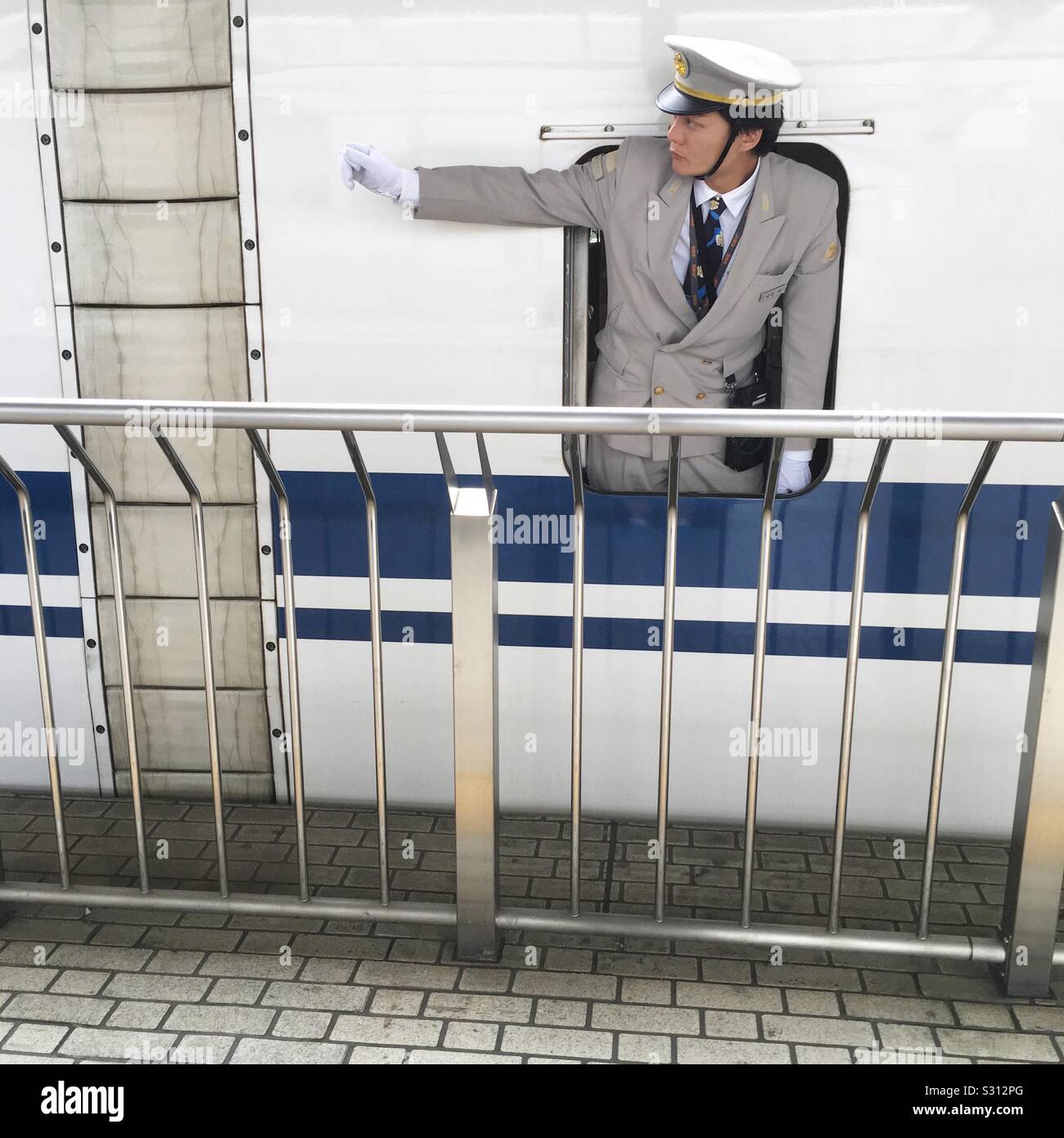 Shinkansen train conductor hi-res stock photography and images - Alamy