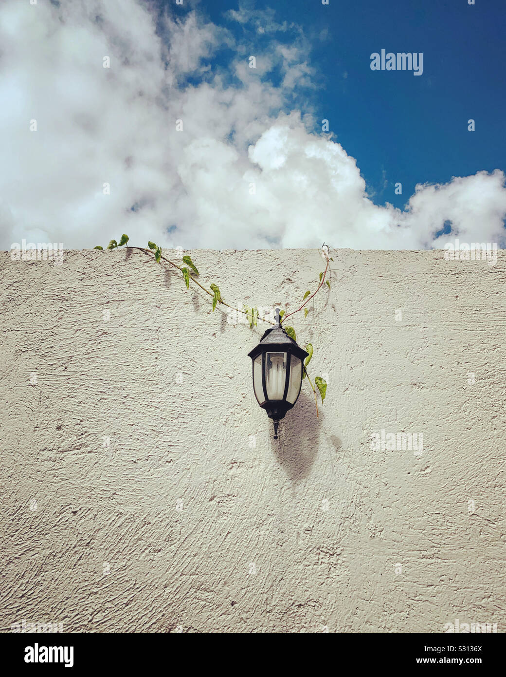 Lamp on a wall Stock Photo - Alamy