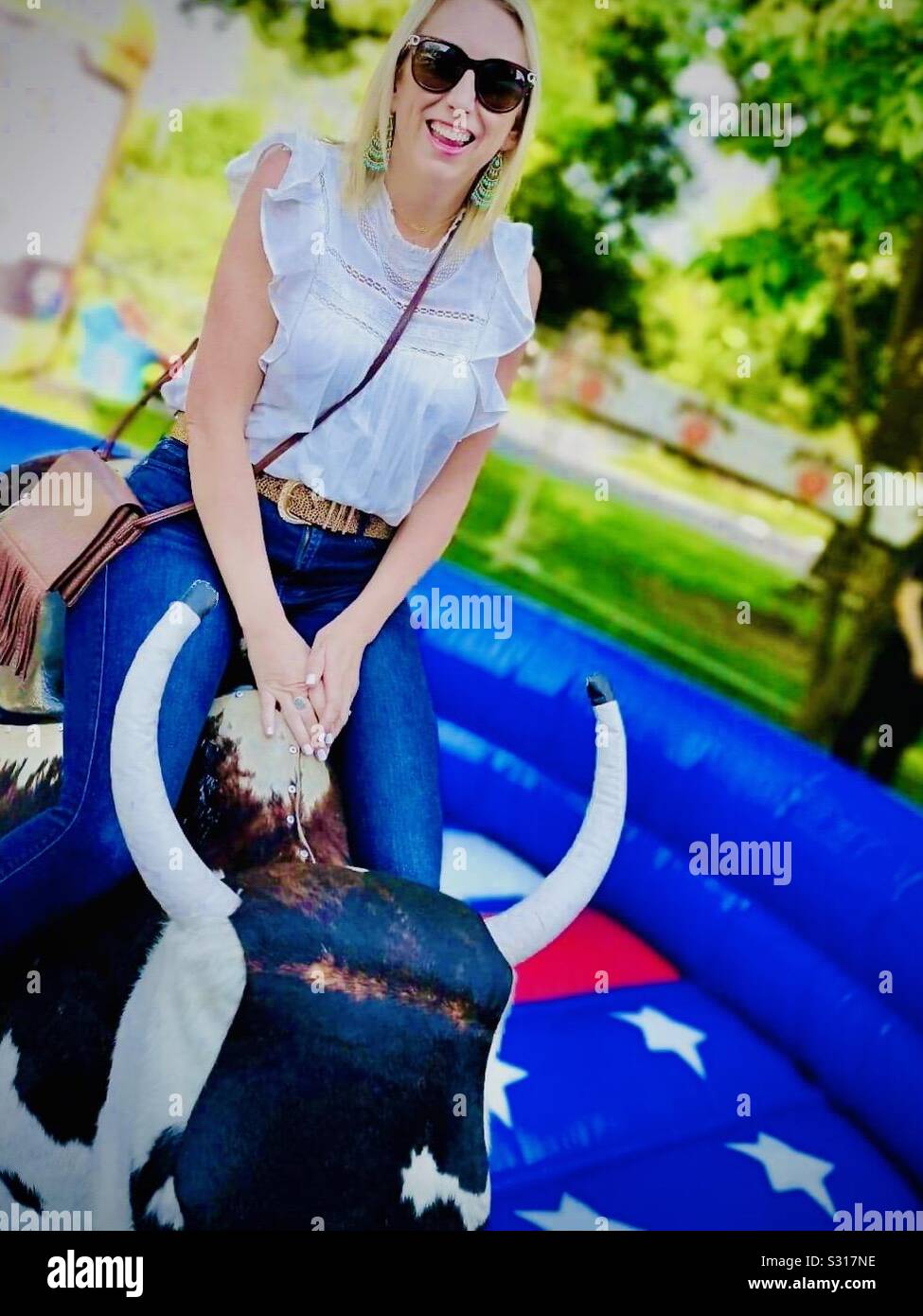 Mechanical bull riding hi-res stock photography and images - Alamy