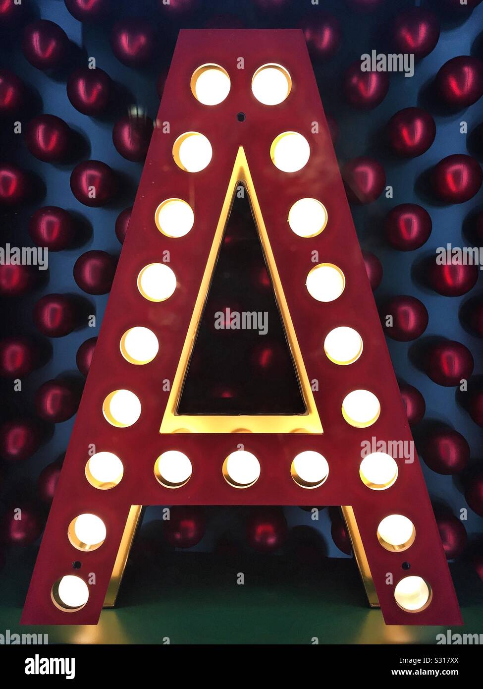 The letter "A" made with light bulbs Stock Photo - Alamy