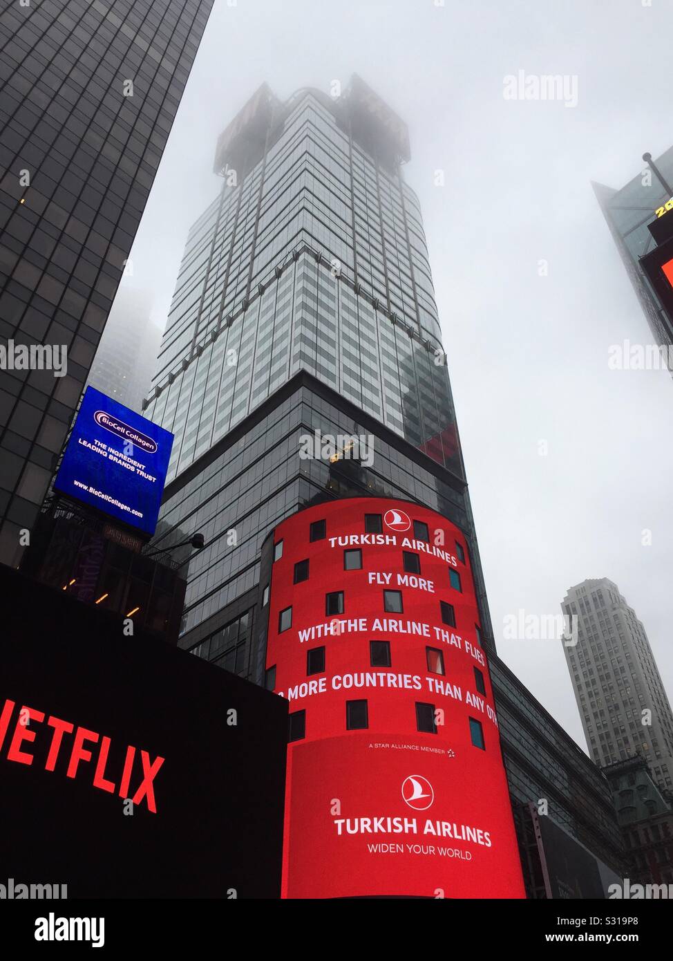 The NASDAQ building in times square on a foggy evening, NYC, USA Stock ...