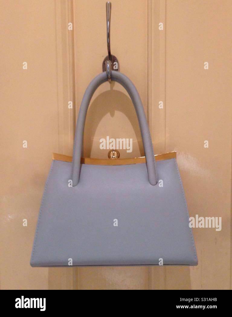 Bag hung up hi-res stock photography and images - Alamy