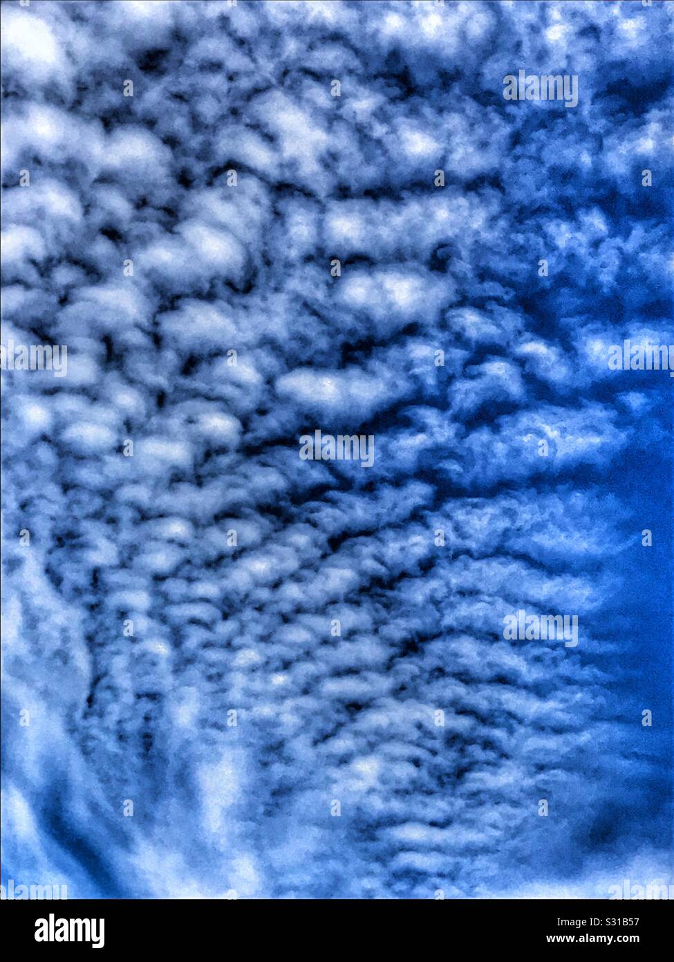 Mackerel sky clouds hi-res stock photography and images - Alamy
