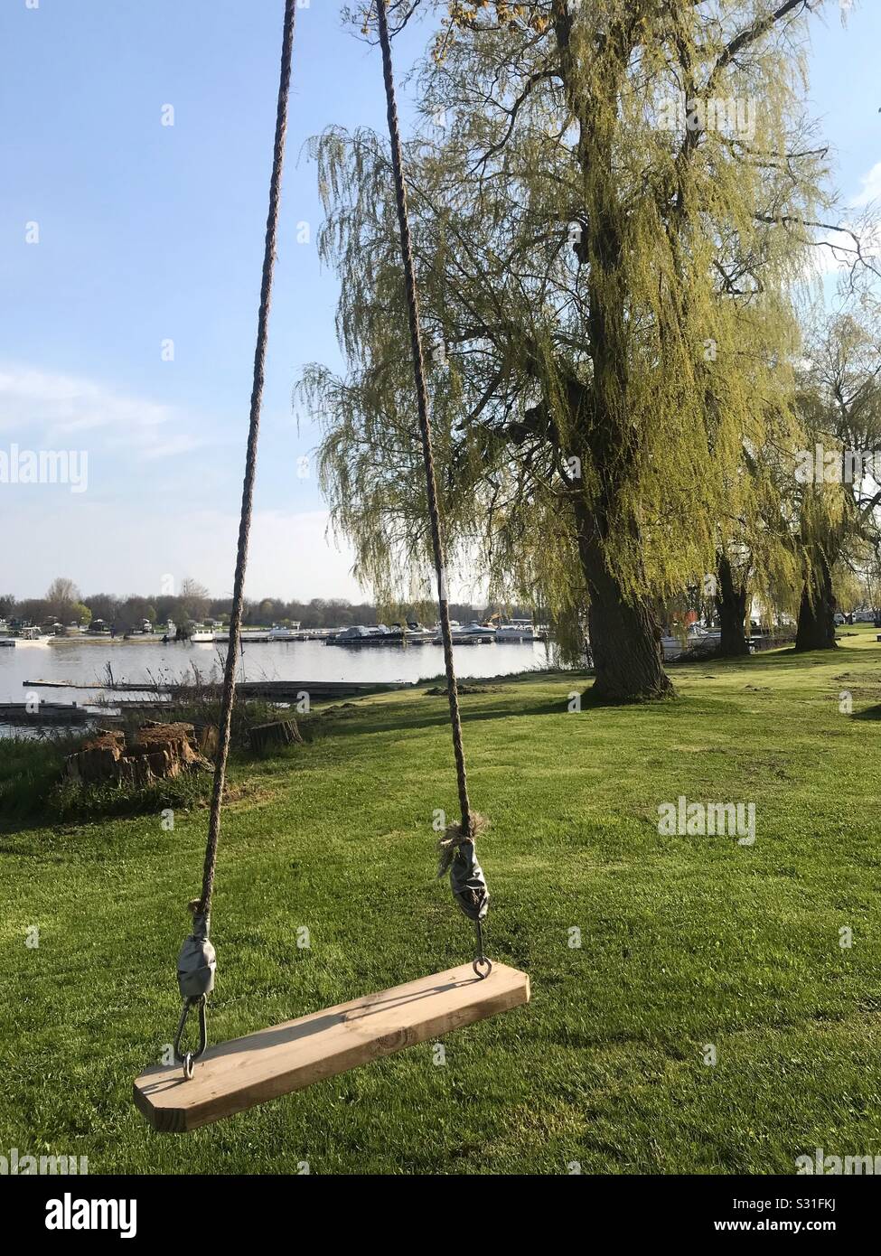Old wooden swing hi-res stock photography and images - Alamy