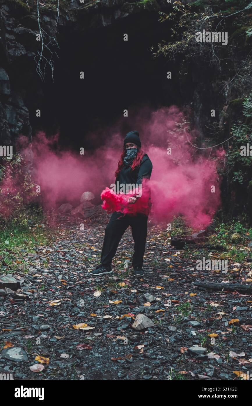 Red Smoke Bomb High Resolution Stock Photography and Images - Alamy