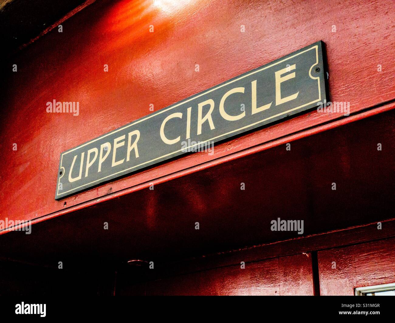 Upper Circle sign outside theatre Stock Photo - Alamy