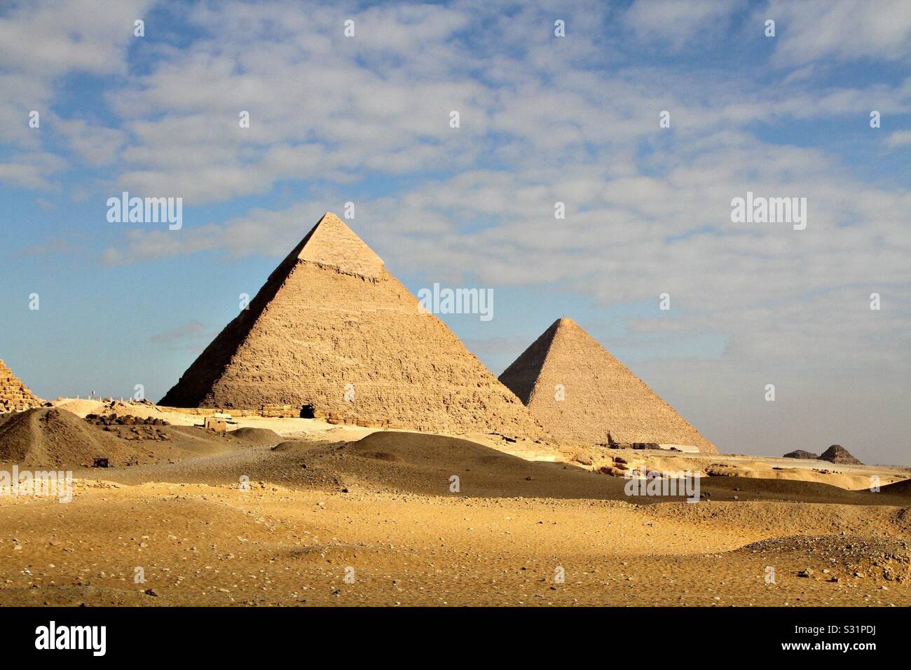 Two of the Pyramids of Giza, seen from a distance across the desert ...