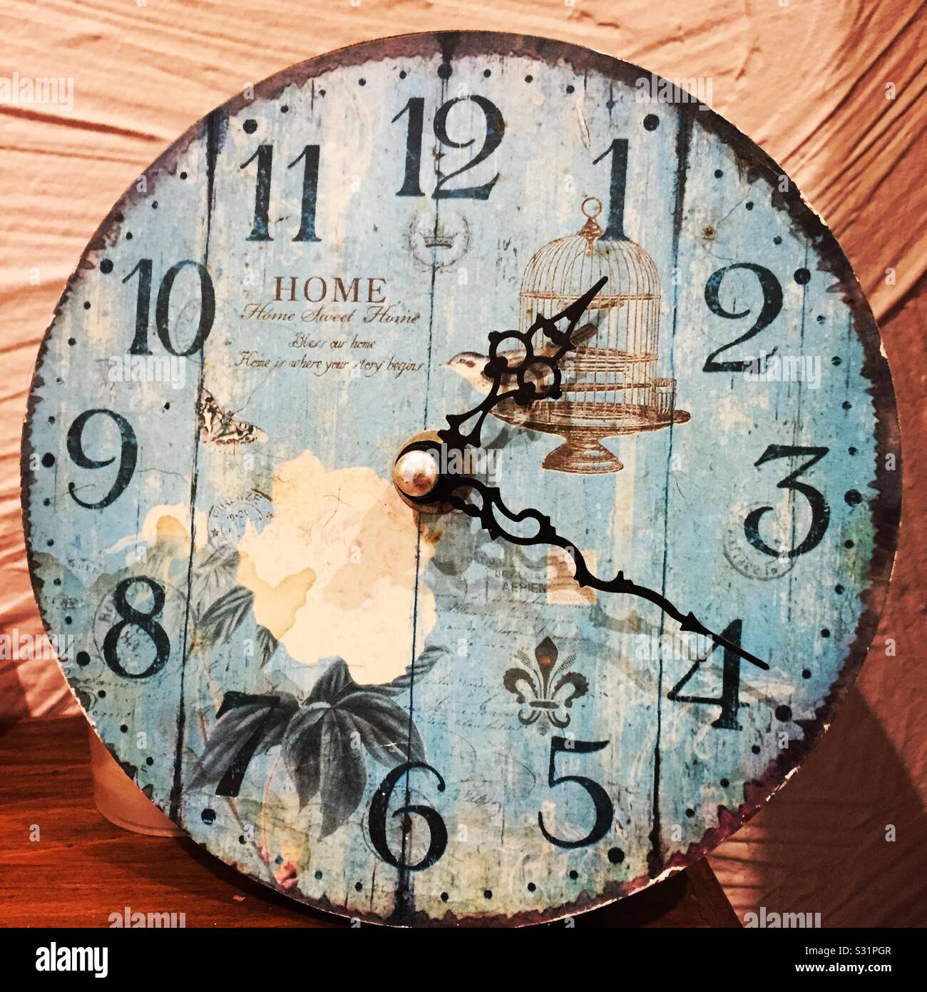 Vintage style blue clock Stock Photo - Alamy