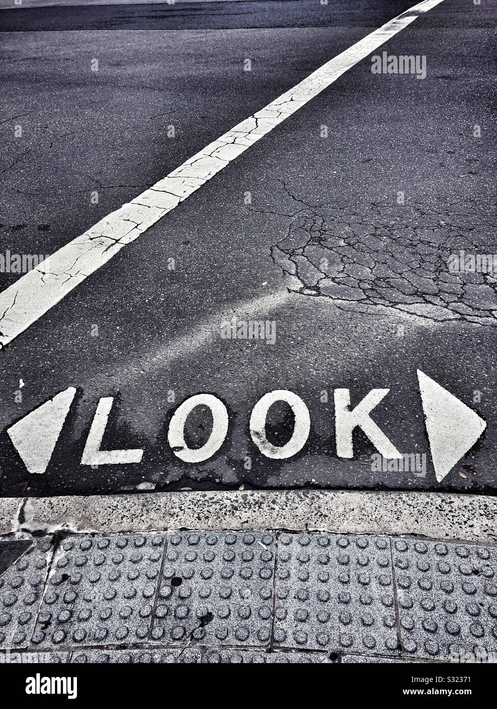 Pedestrian look both ways hi-res stock photography and images - Alamy