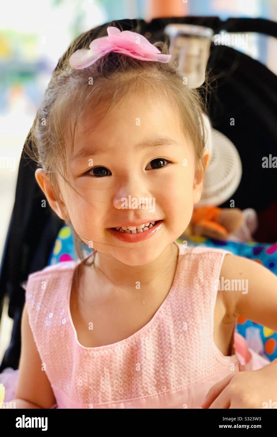 Cute girl smiling Stock Photo - Alamy