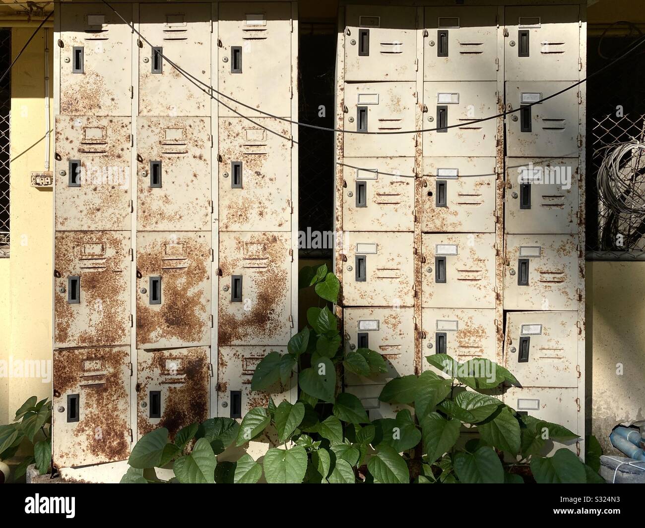 Old school rusty metal locker Stock Photo - Alamy