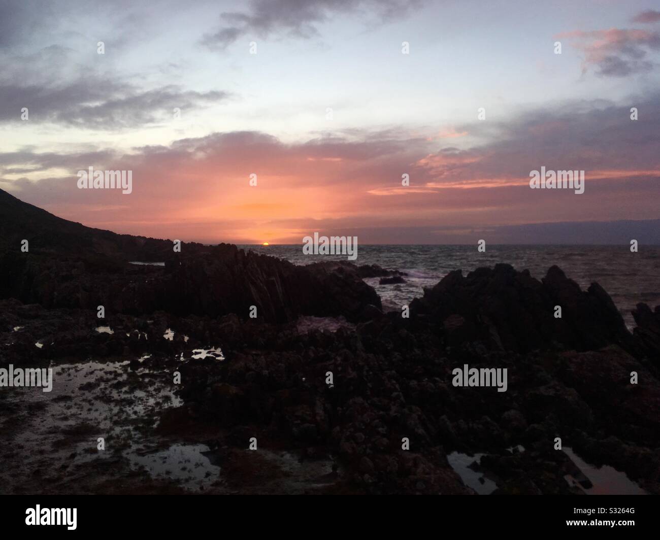 Sunset over The Irish Sea and Rocks at Port Logan, Dumfries and ...