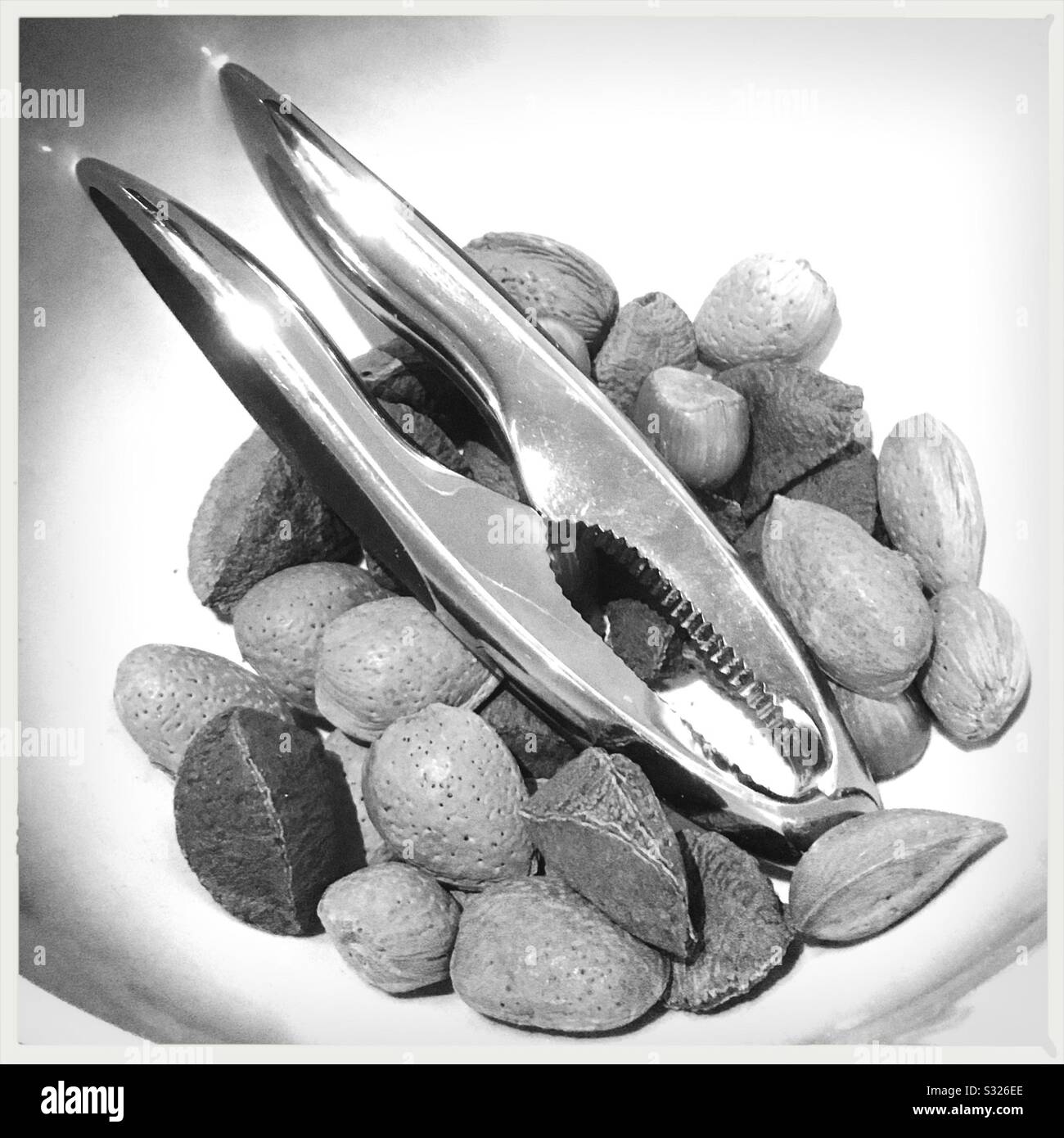 Nut cracker and hand hi-res stock photography and images - Alamy