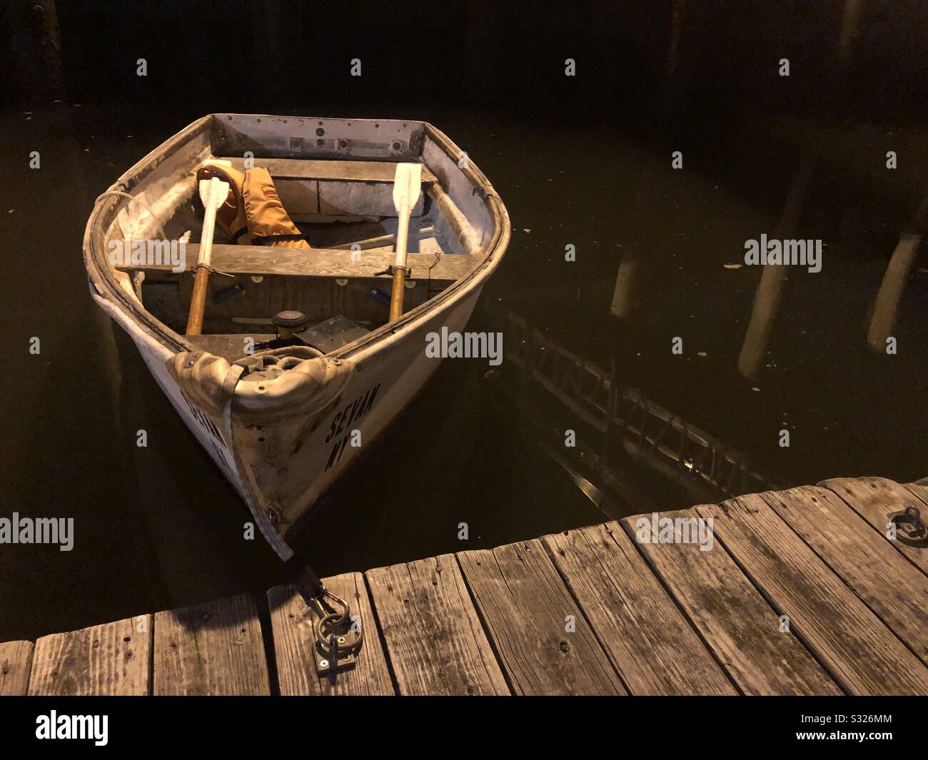 Empty rowboat hi-res stock photography and images - Alamy