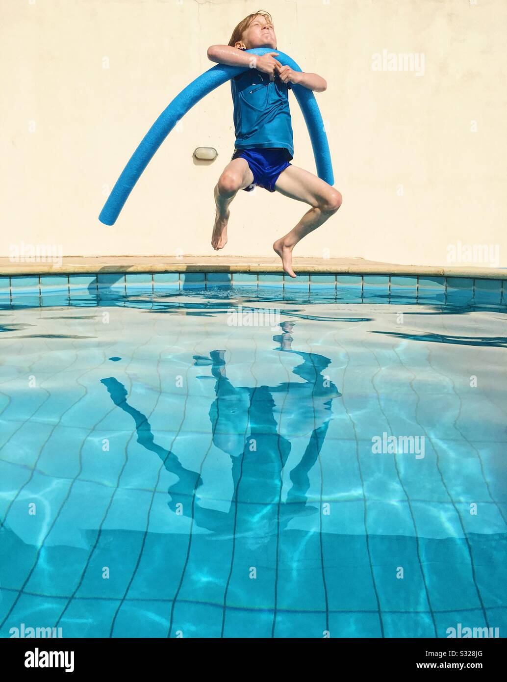 Pool jumping float hi-res stock photography and images - Alamy
