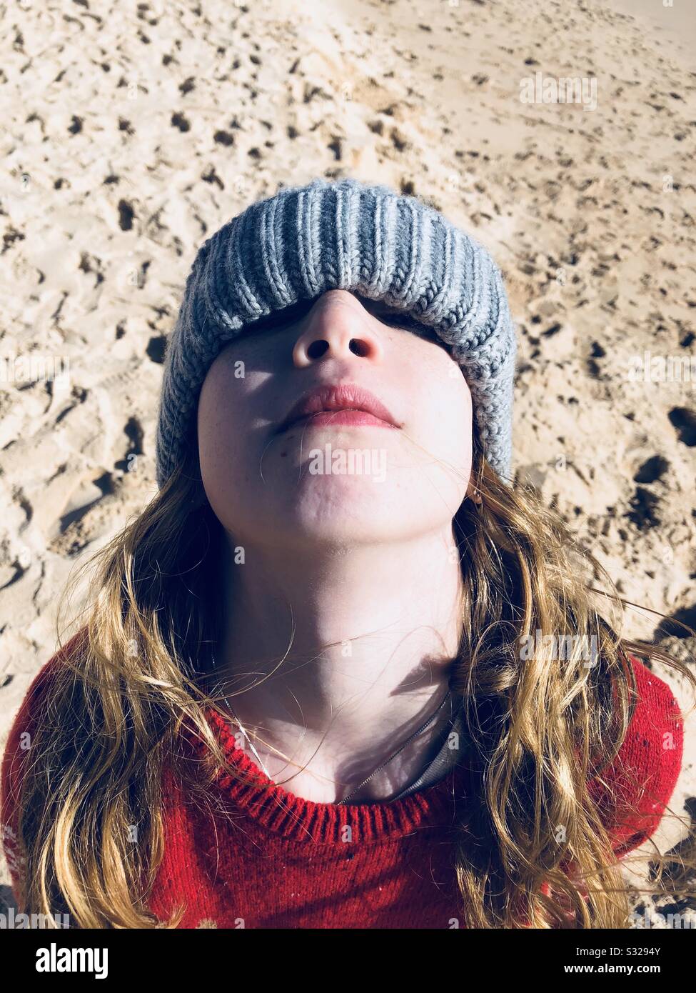 Woolly hat over eyes hi-res stock photography and images - Alamy