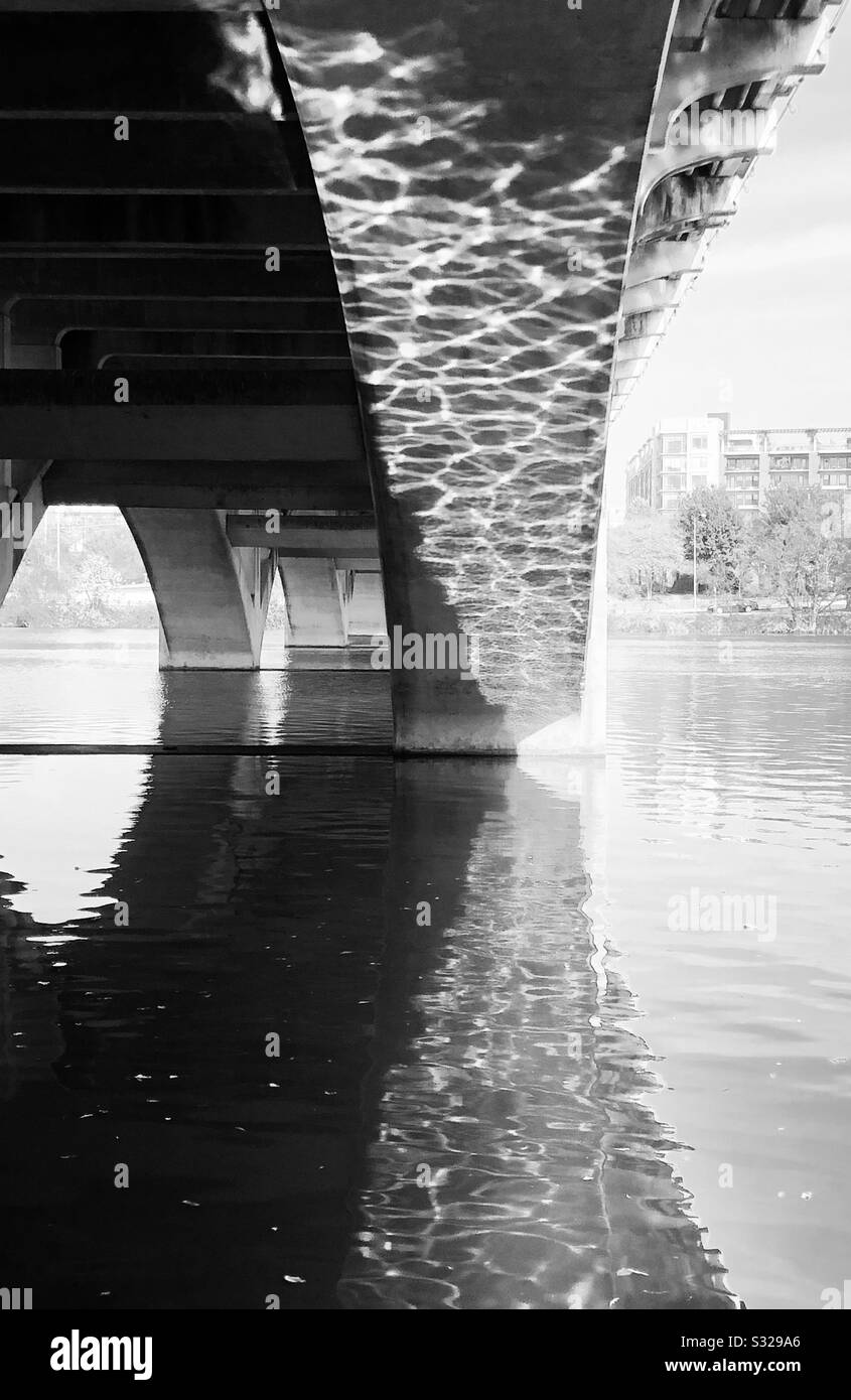 Lake water pattern reflections under bridge in Austin Texas Stock Photo ...