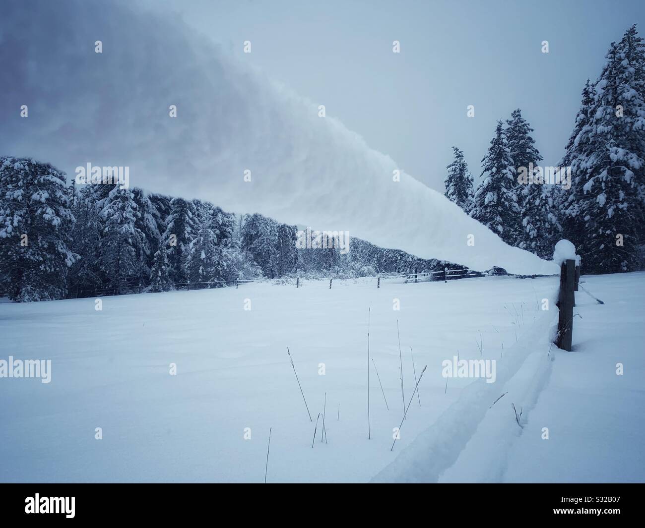 Snow covered fence Stock Photo - Alamy