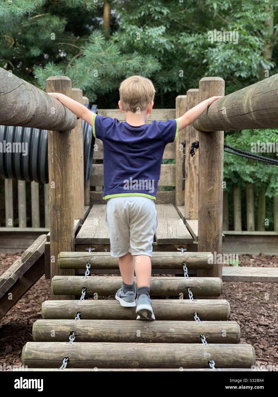 Child walking bridge hi-res stock photography and images - Alamy