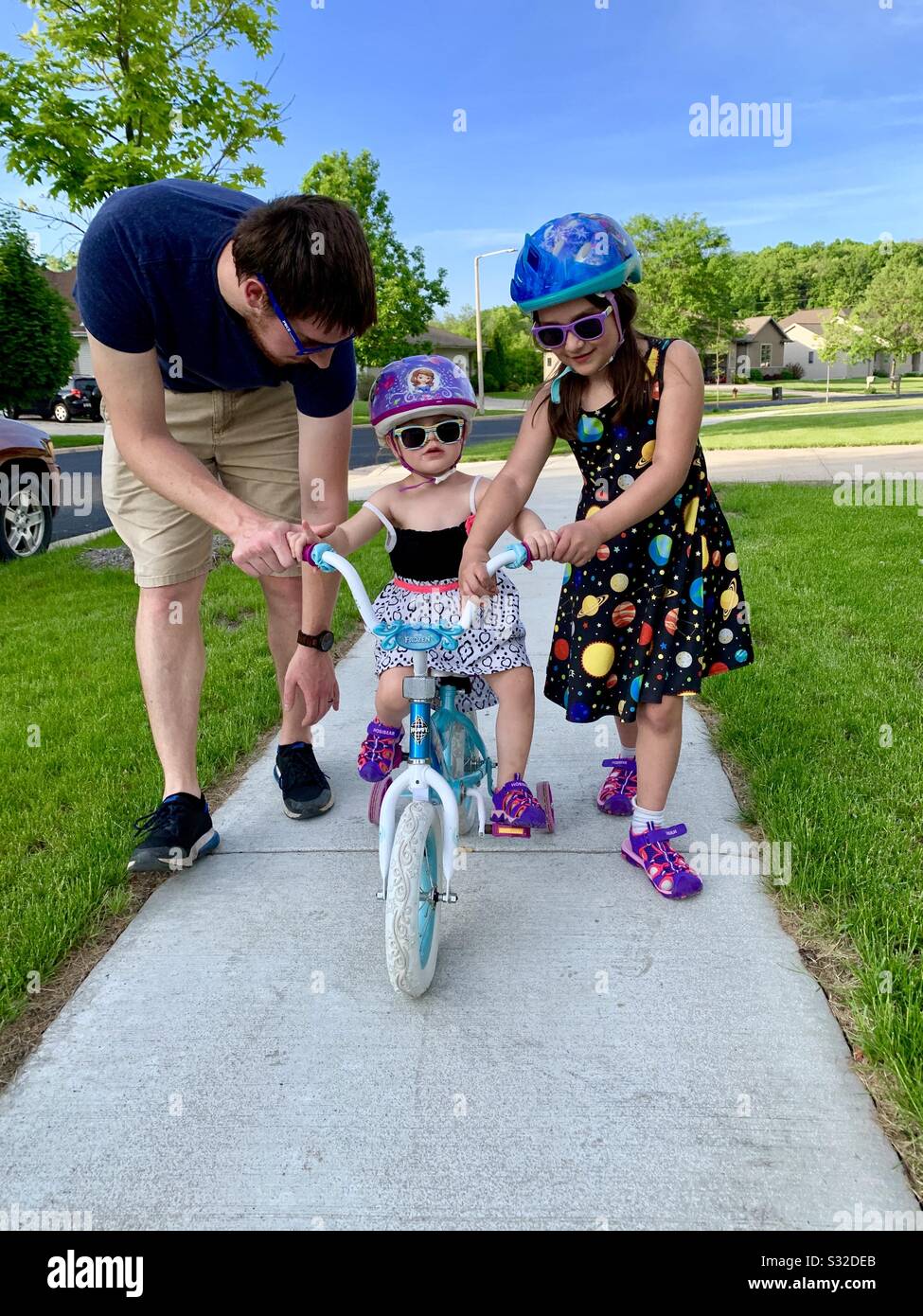 Learning To Ride A Bike High Resolution Stock Photography and Images ...