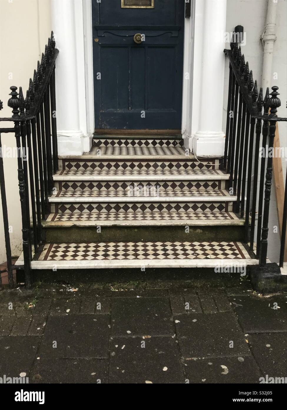 Tiled steps up to a Victorian house on Old Steine, Brighton Stock Photo ...
