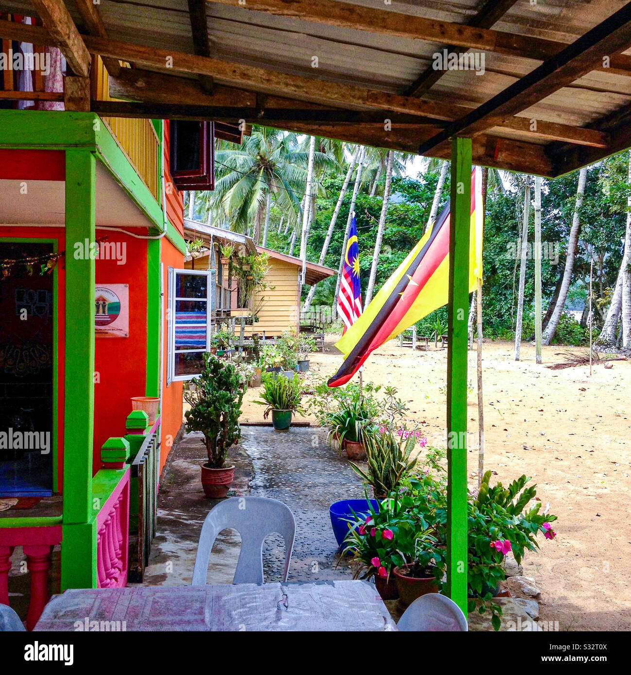 Colourful local house porch of homestay by beach, remote village of ...