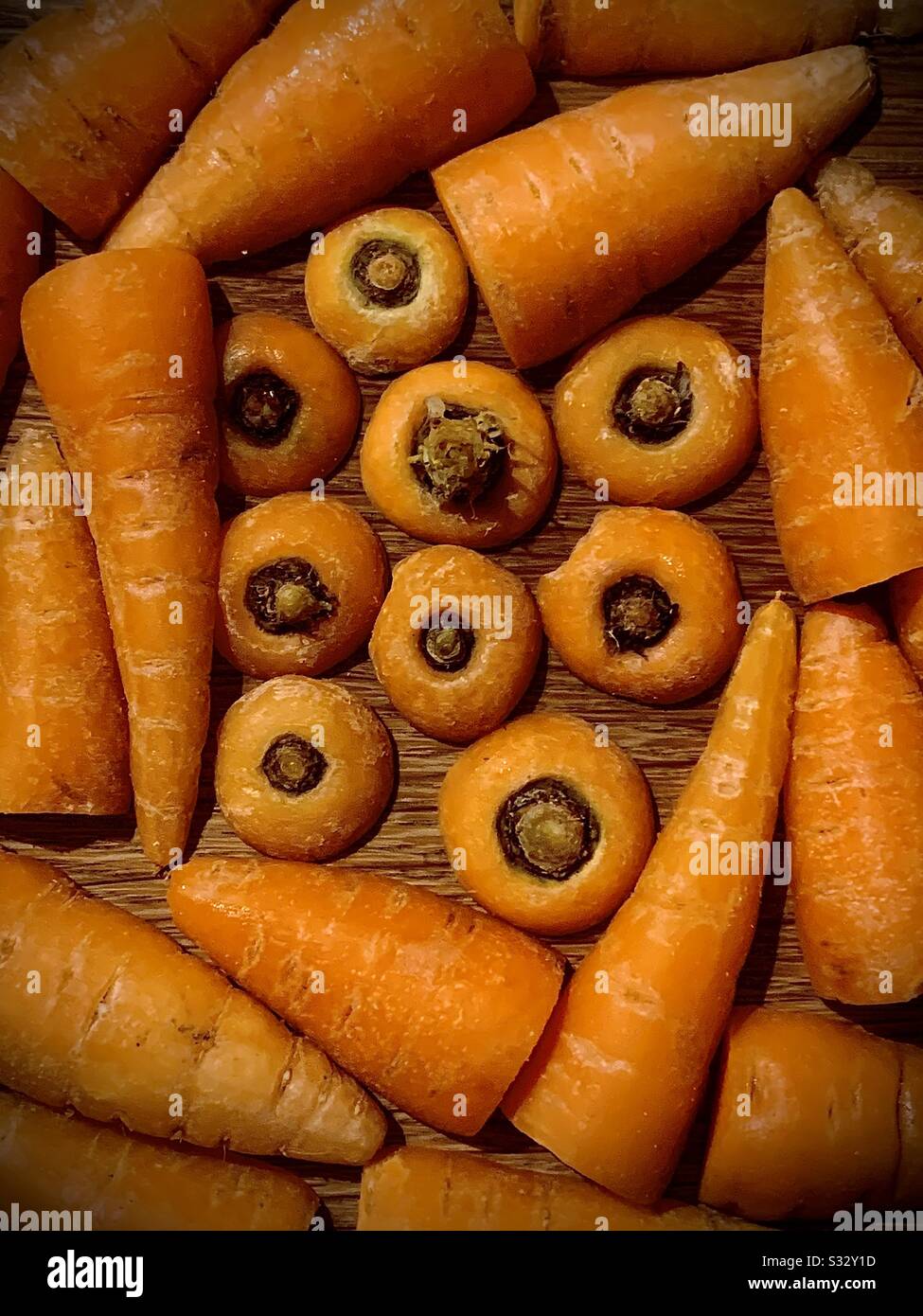 Carrot with tops hi-res stock photography and images - Alamy