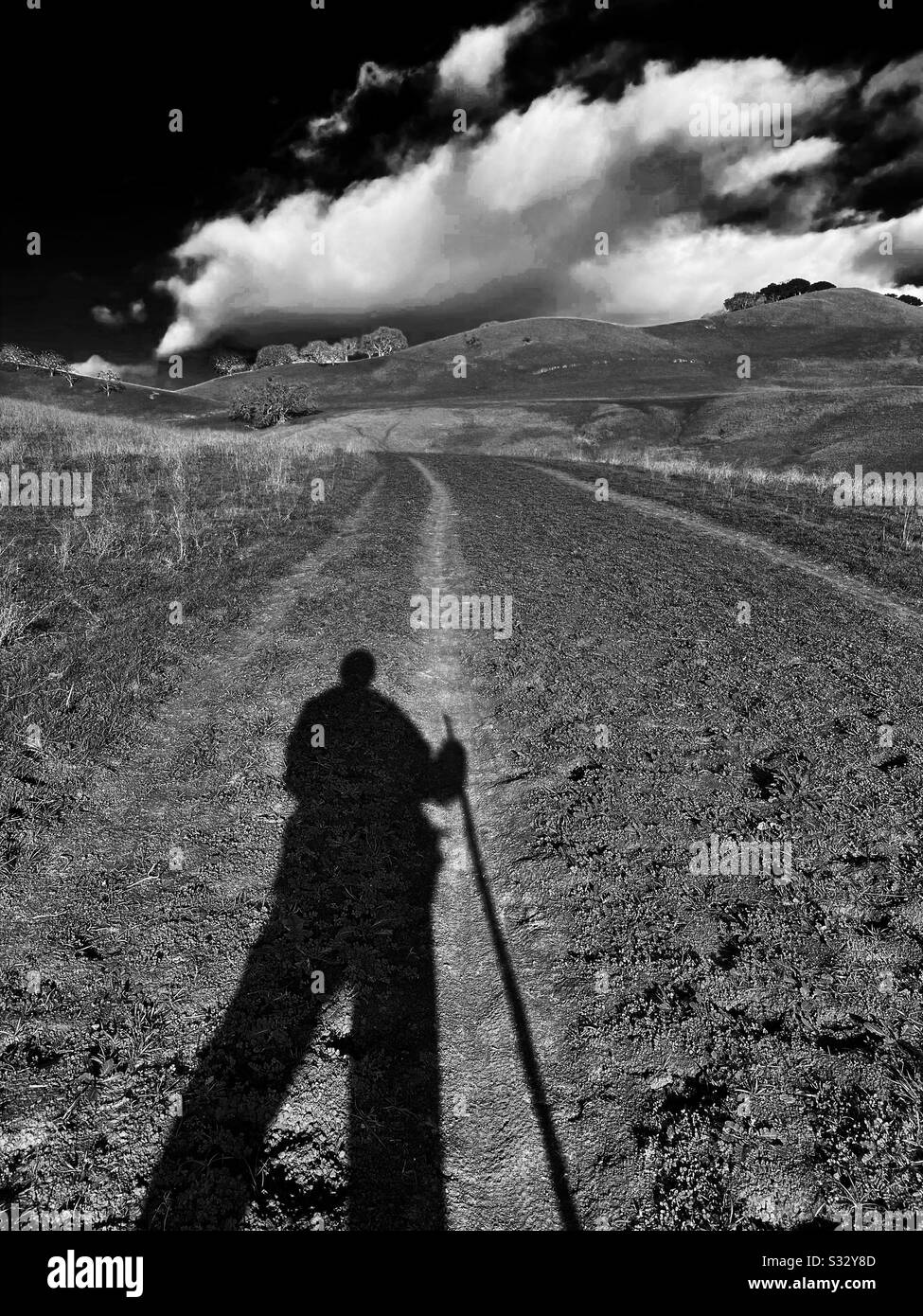 Shadow of hiker Black and White Stock Photos & Images - Alamy