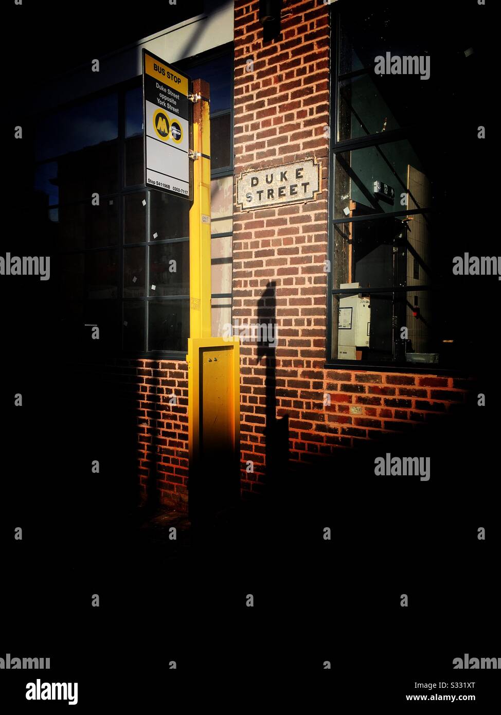 Bus Stop Shadow Stock Photo - Alamy