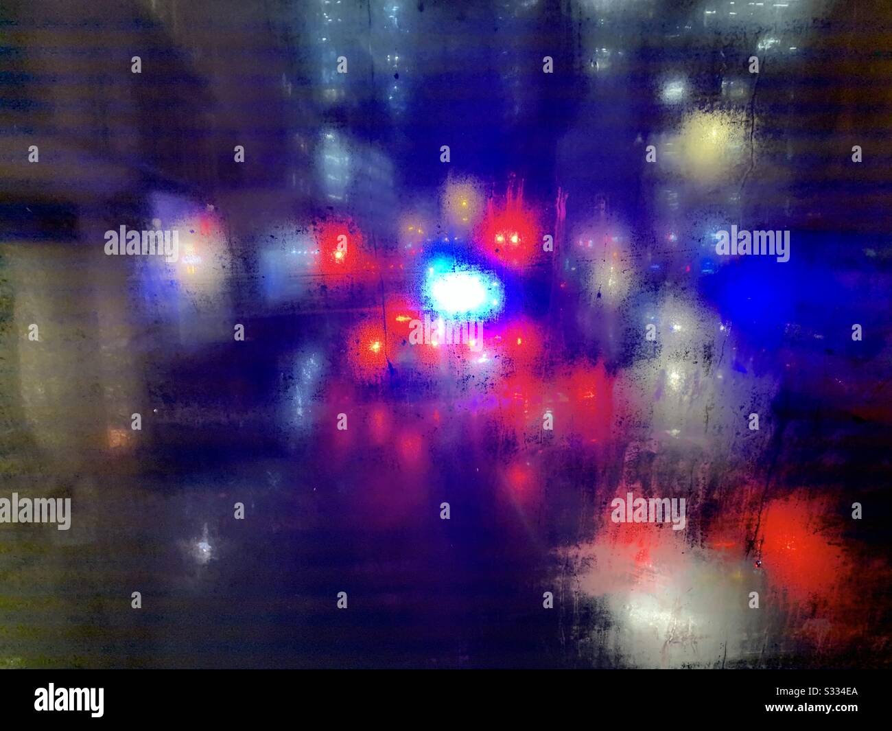 Blurry window with condensation looking into traffic lights Stock Photo ...