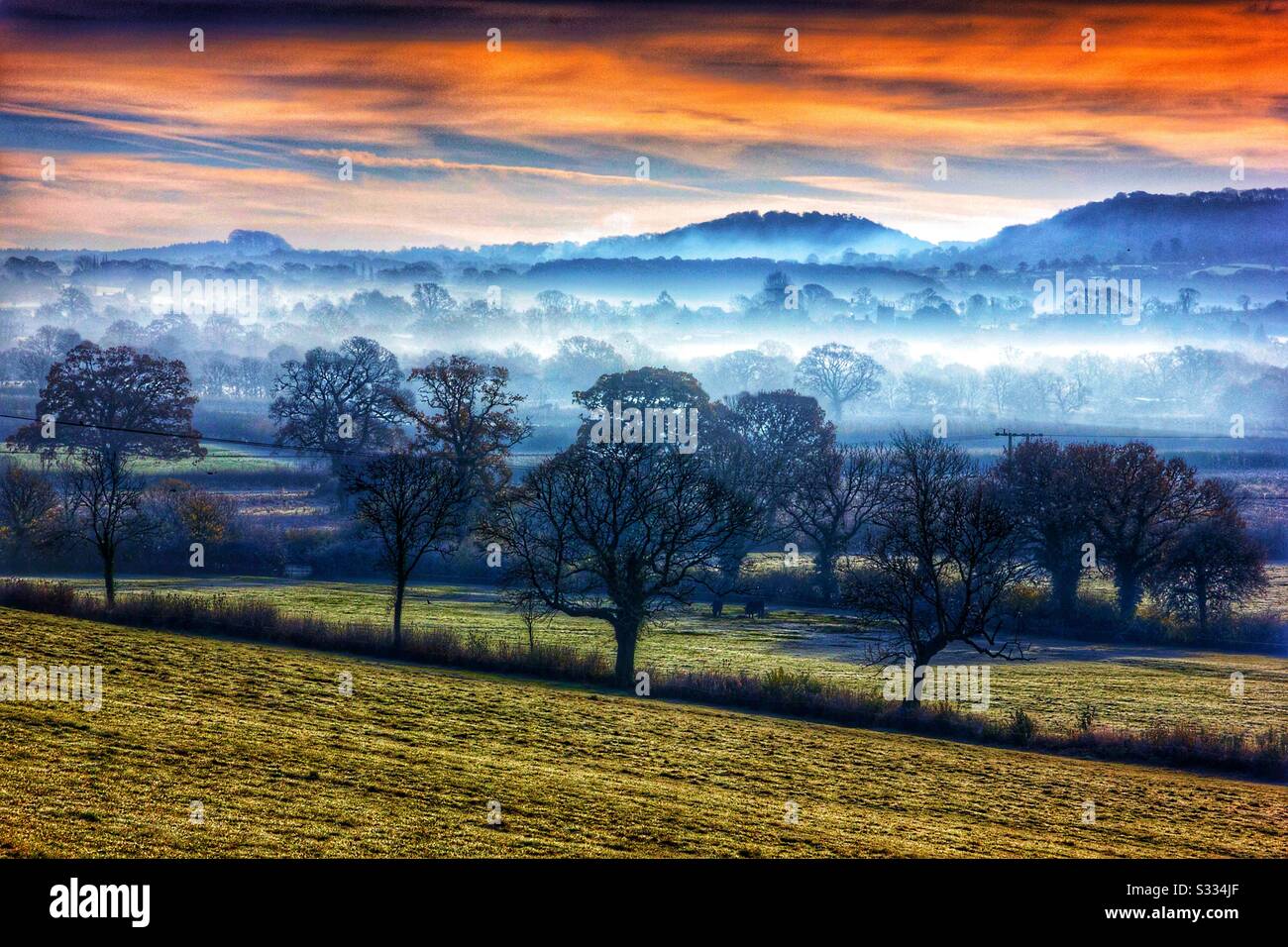 Misty morning landscape Stock Photo - Alamy