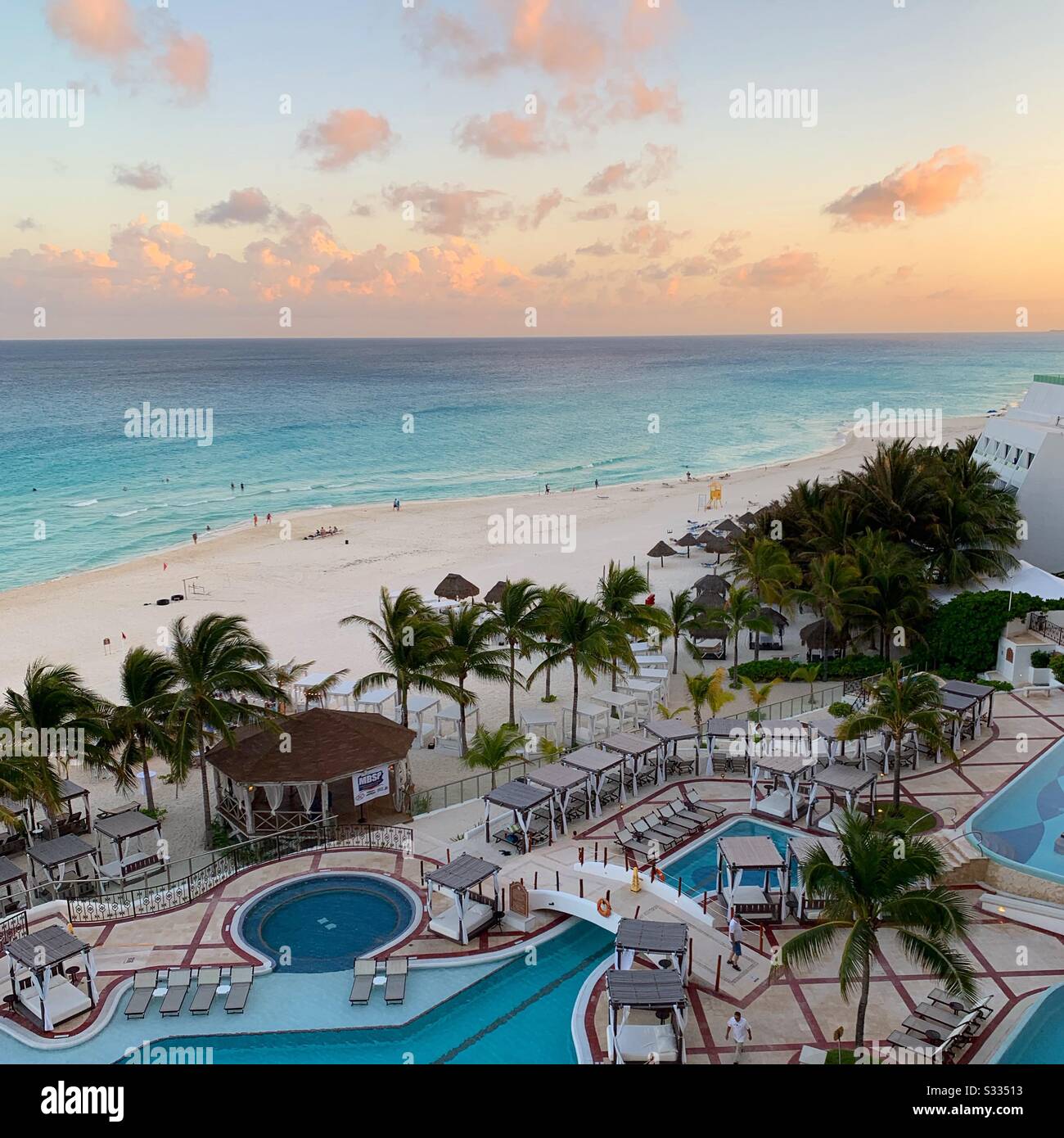 Looking out over the pool and beach from a balcony at sunset, Hyatt ...