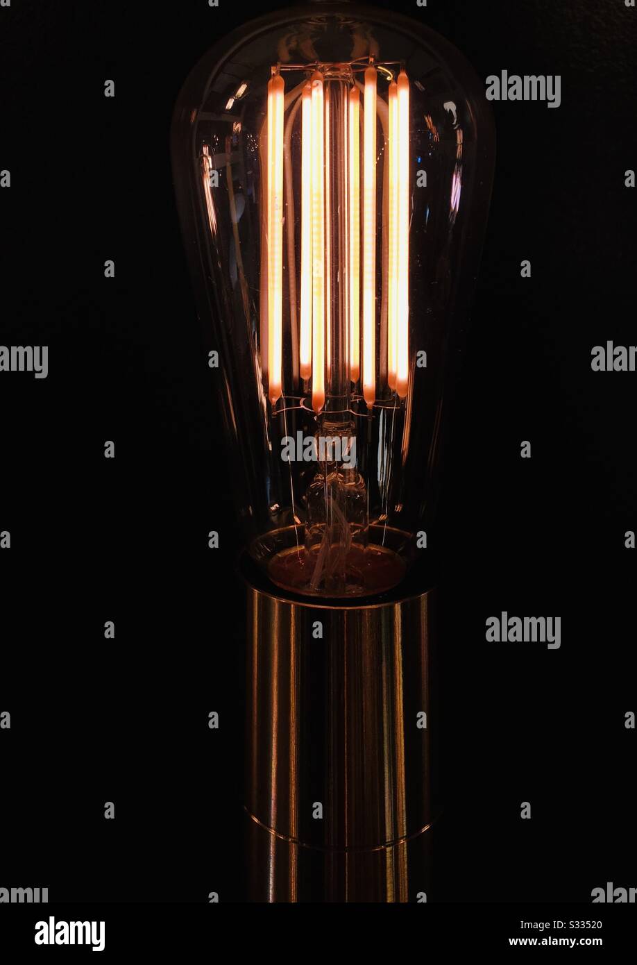 Illuminated light bulb filaments Stock Photo - Alamy