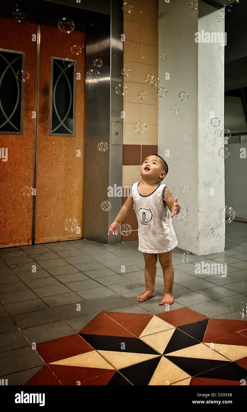 Baby with bubbles hi-res stock photography and images - Alamy