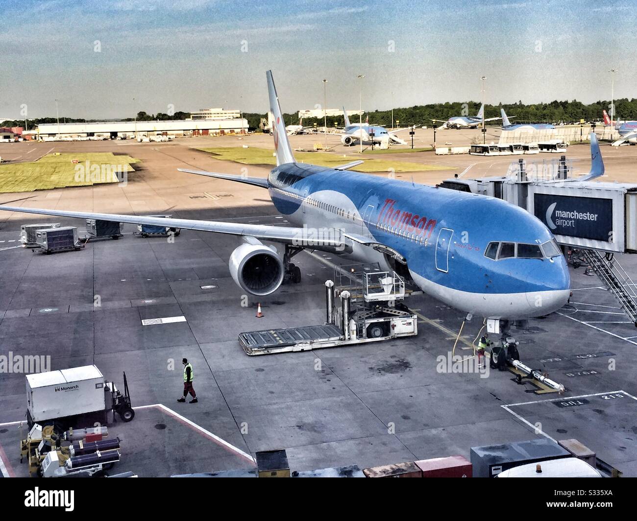 Manchester Airport showing Thomson Aircraft now known as TUI Stock ...