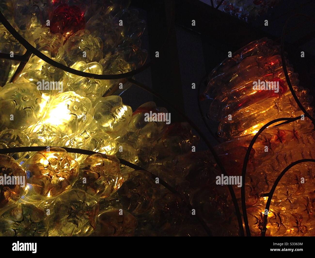 Lights in plastic bottles art Stock Photo - Alamy