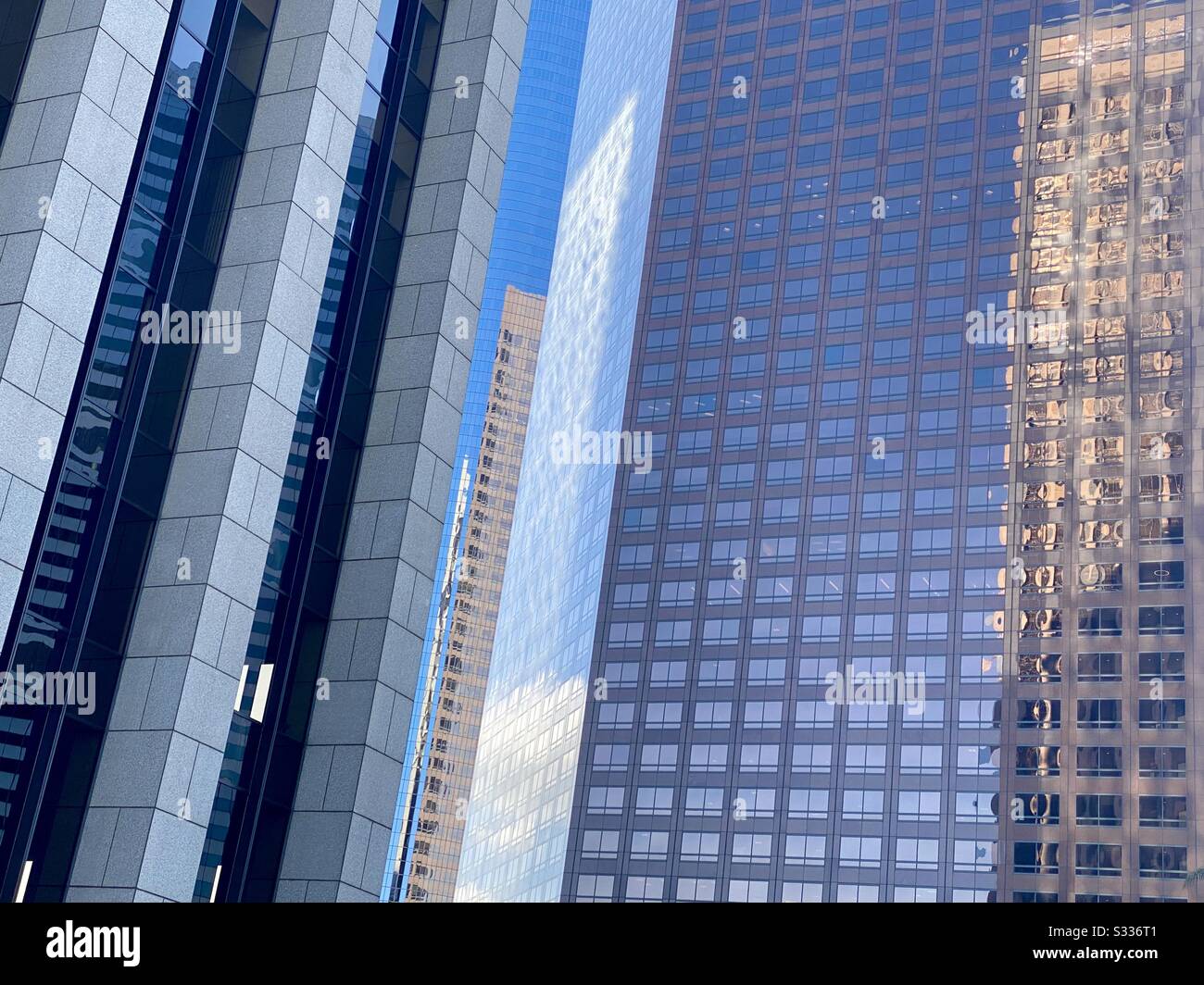 LOS ANGELES, CA, JAN 2020: detail of windows and blue sky reflections ...