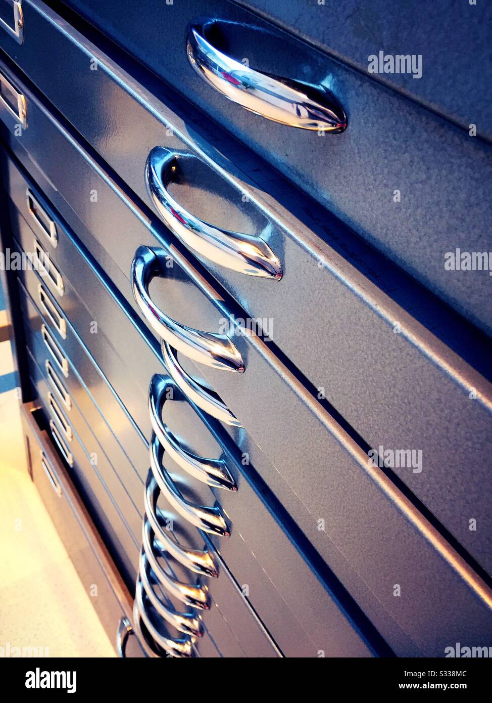 Old-fashioned metal storage drawers for an architects blueprints, USA ...