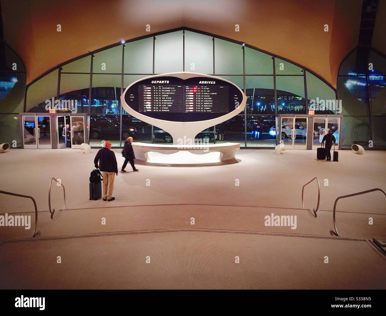 The restored entrance to the TWA hotel features an arrival and ...