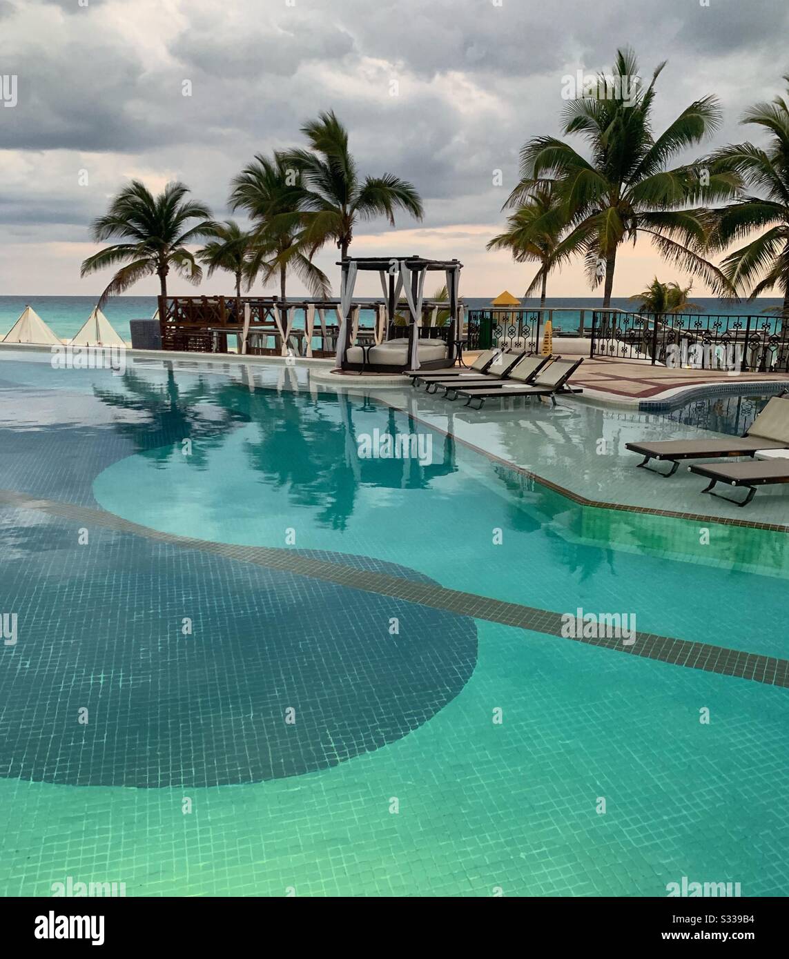 Evening view of the pool and the ocean beyond, Hyatt Zilara, Cancun ...