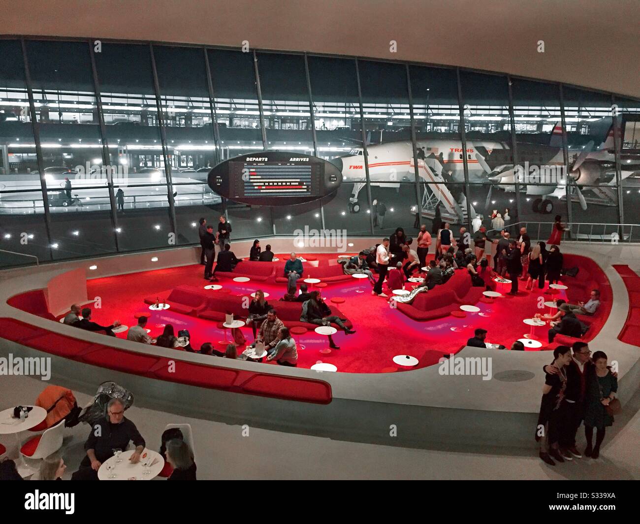 The sunken lounge at the TWA hotel is the center of the restored lobby ...