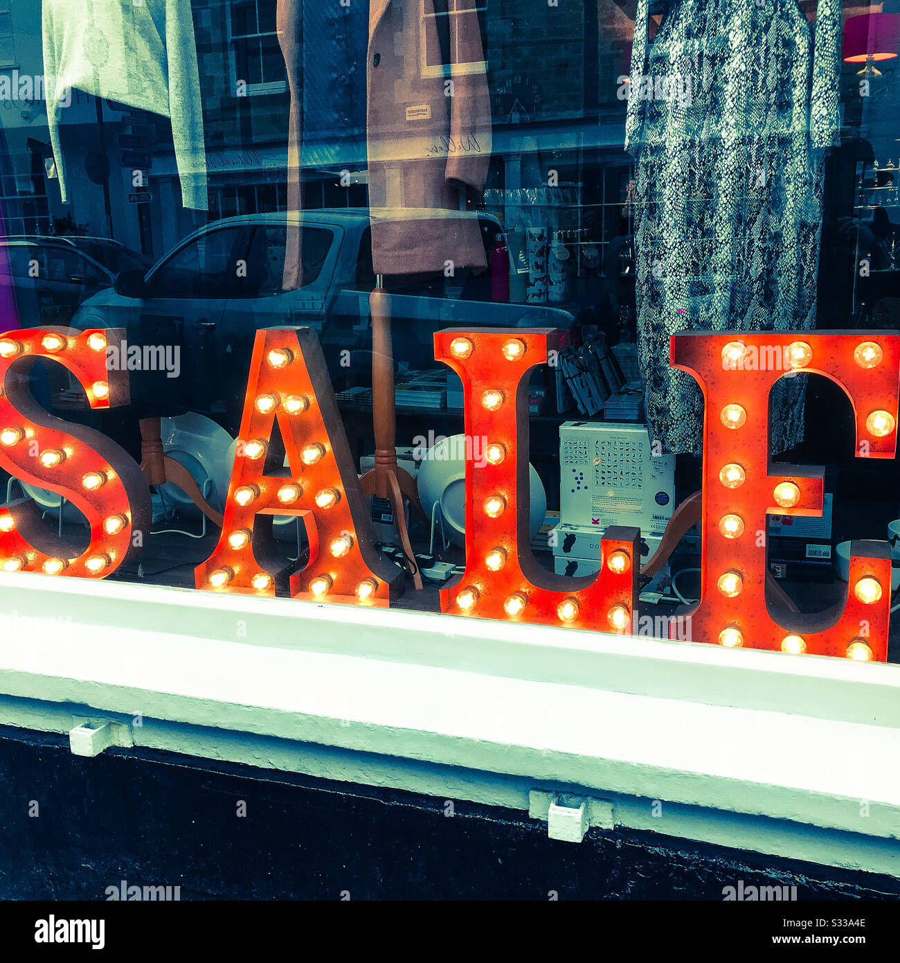 Lit shop window hi-res stock photography and images - Alamy