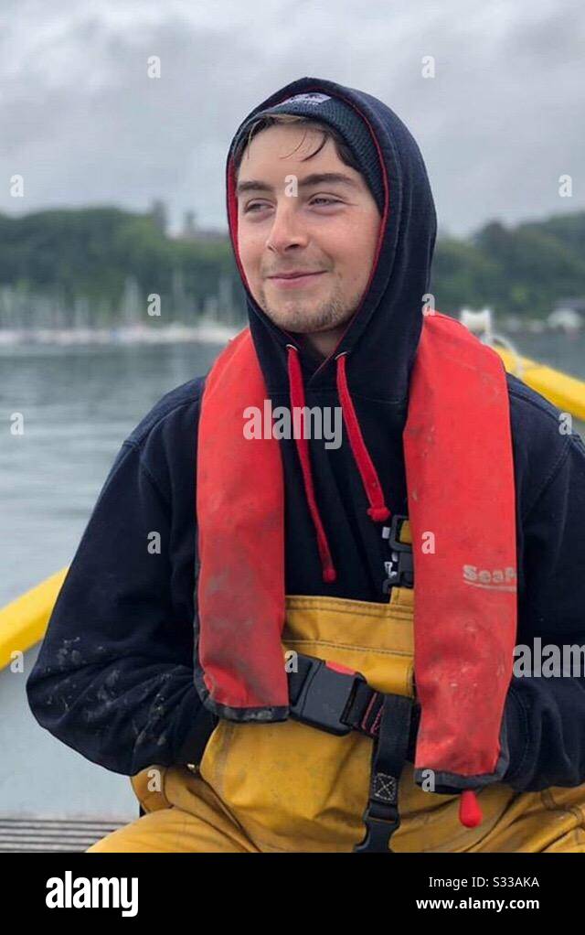 Boy on boat hi-res stock photography and images - Alamy