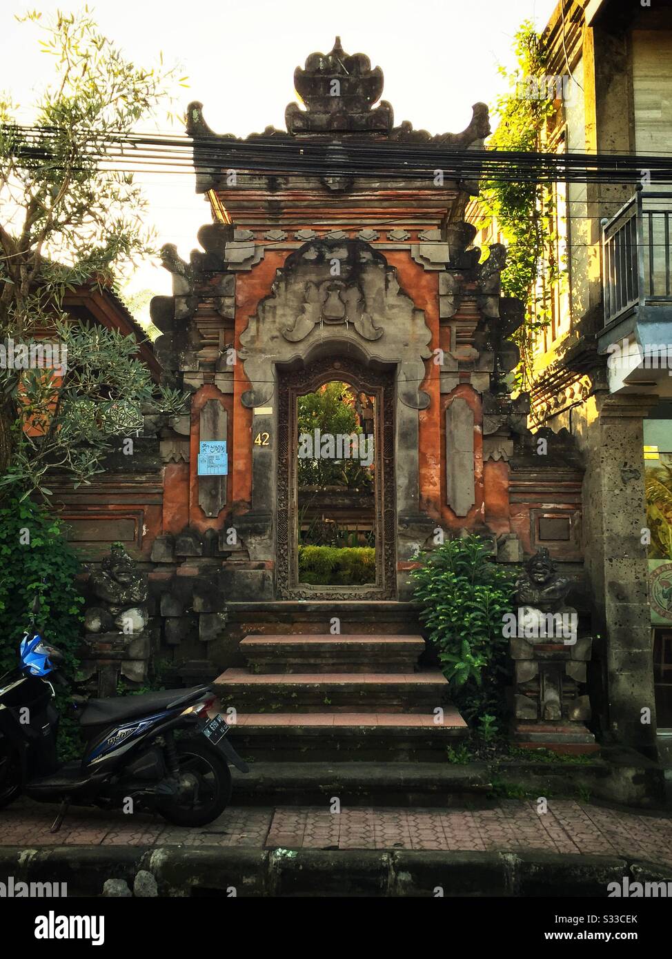 Ornate entrance gate to a residential house compound in Ubud, Bali ...