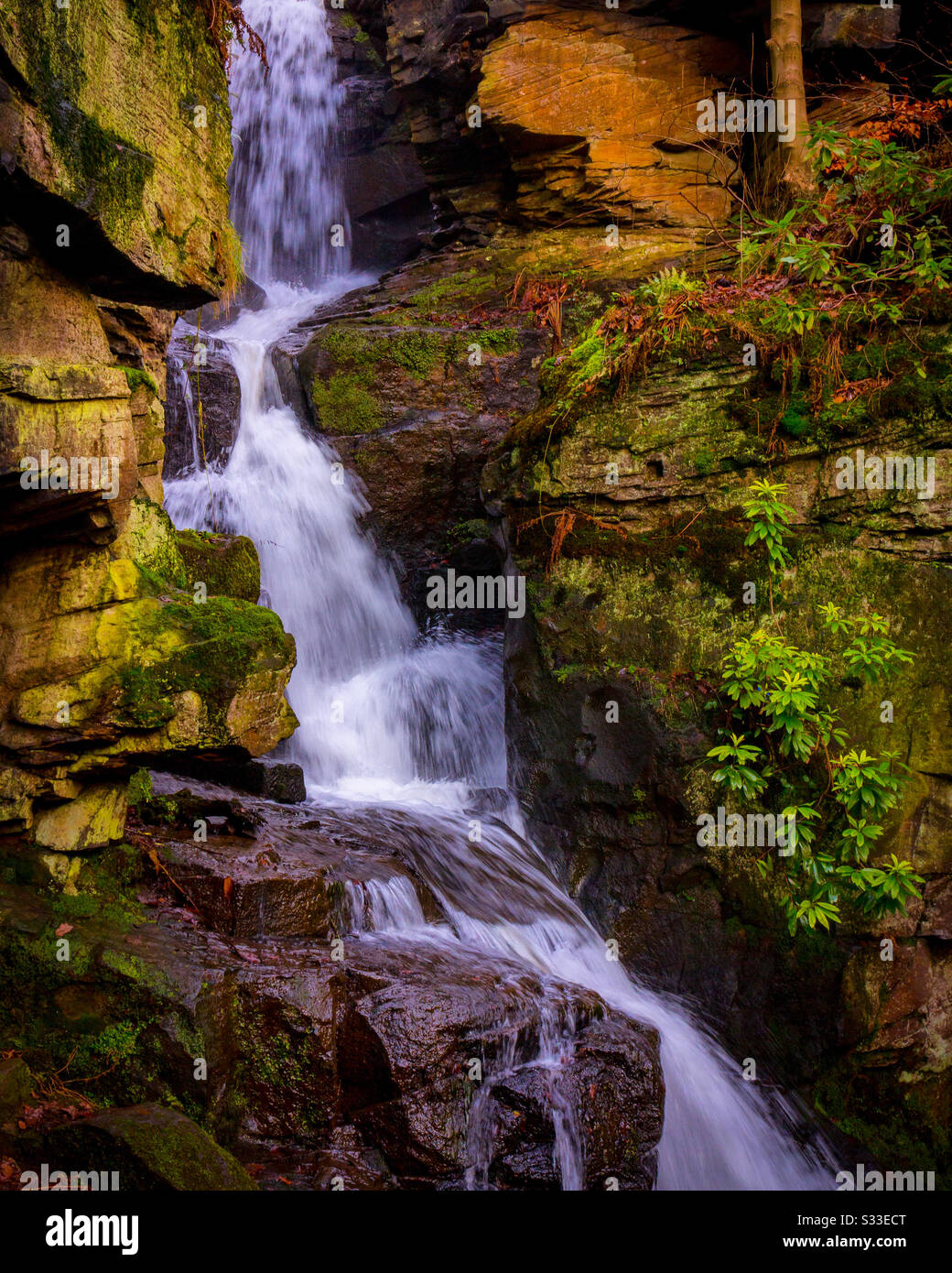 Waterfall at Lumsdale near Matlock in the Derbyshire Peak District ...