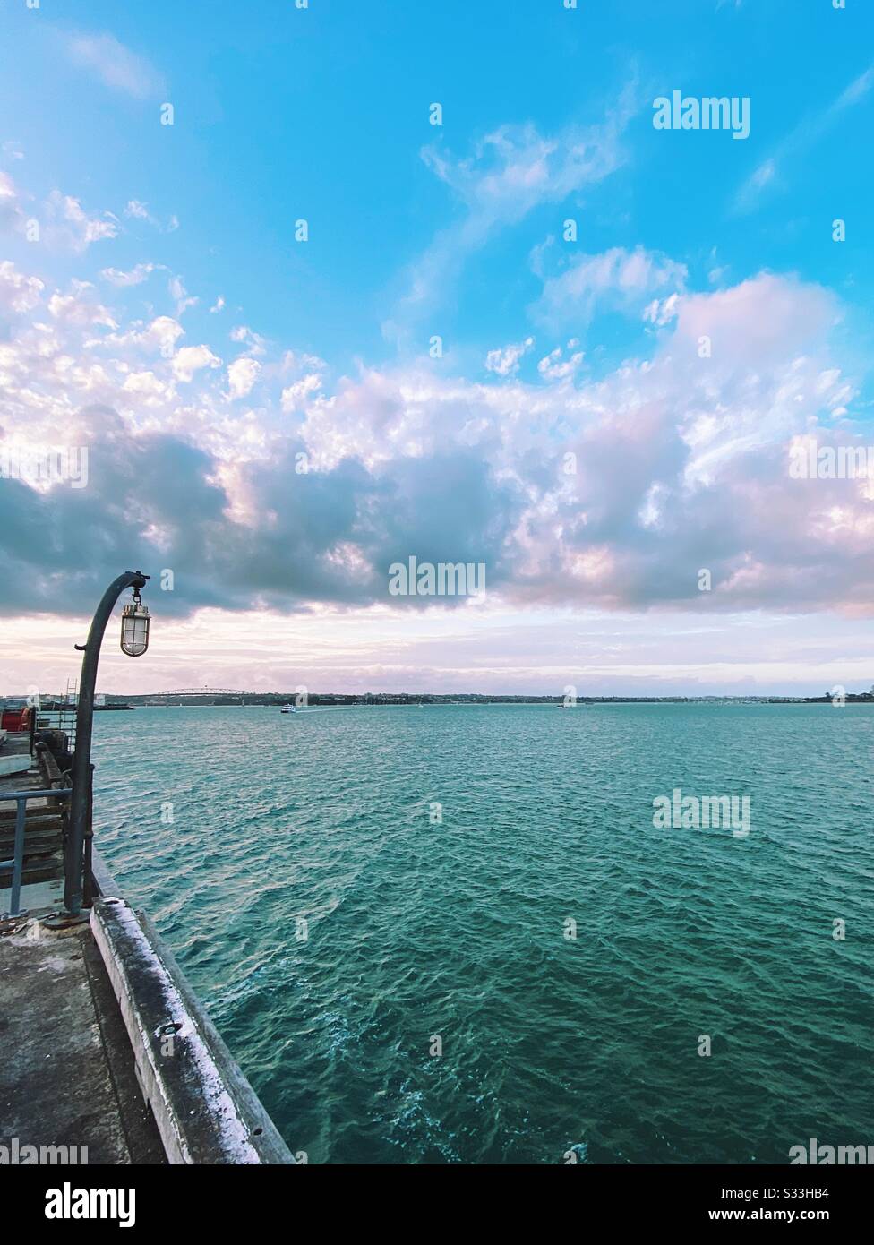 Lamp post at edge of Queens Wharf at Auckland New Zealand harbour ...