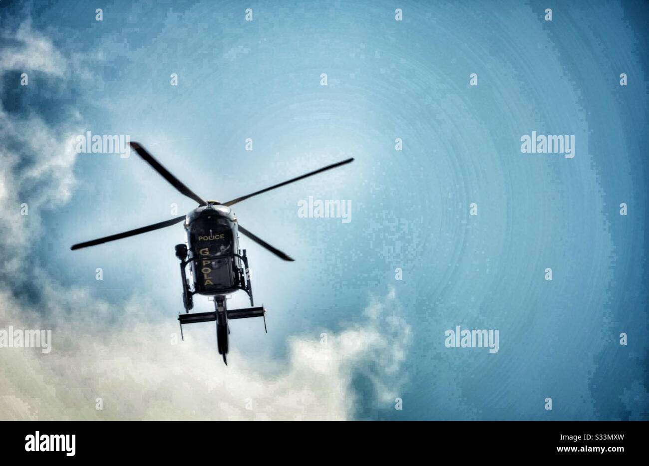 Flying police helicopter hi-res stock photography and images - Alamy
