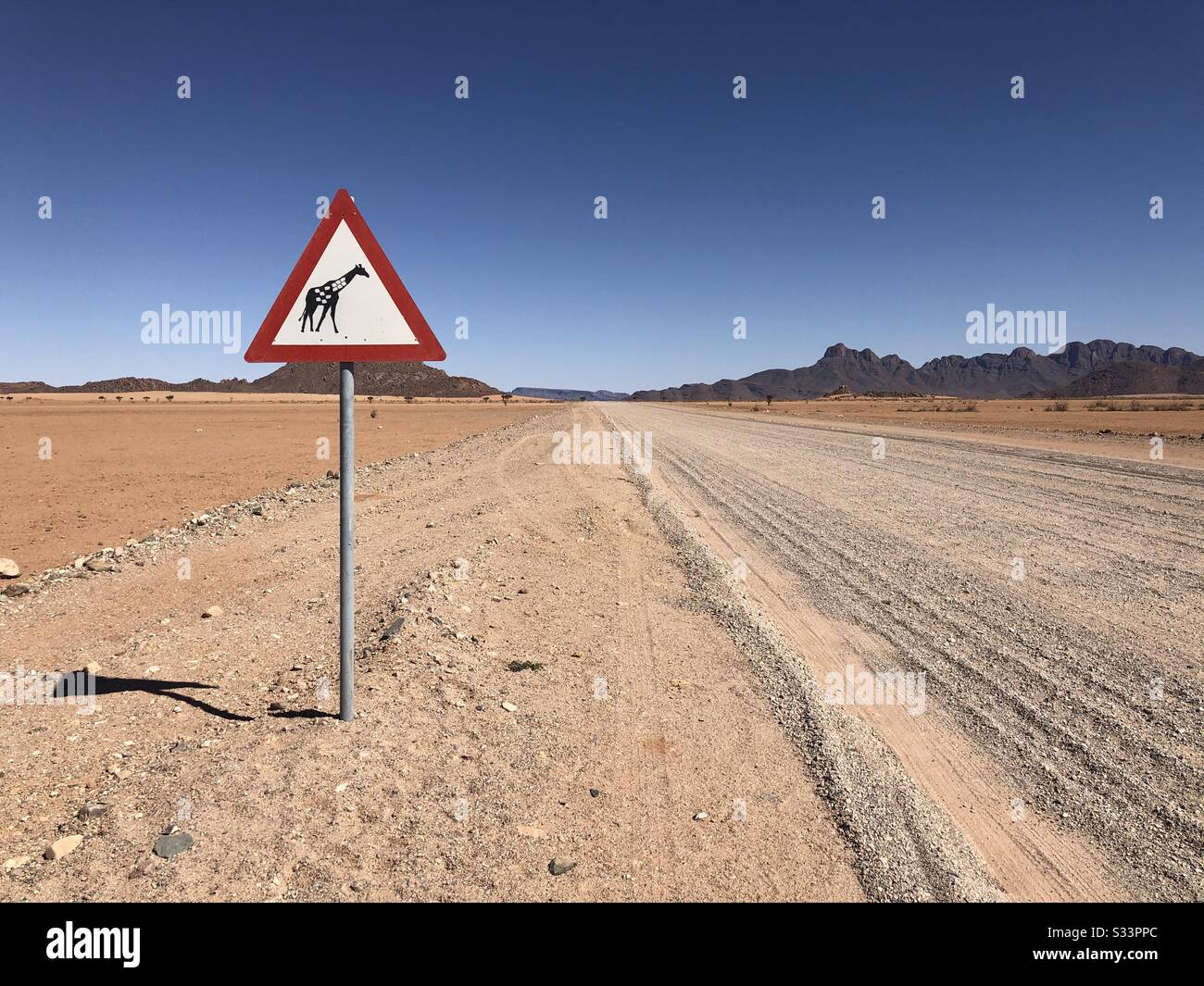 Giraffe sign in Namibia Stock Photo - Alamy